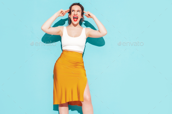 Beautiful smiling model posing in studio Stock Photo by halayalex ...