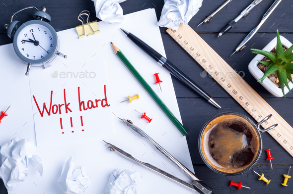 Sticky note with the word Work hard. Office workplace. Stock Photo by ...