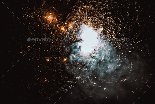 Luminous firecrackers spinning sparks of fire. Stock Photo by ...
