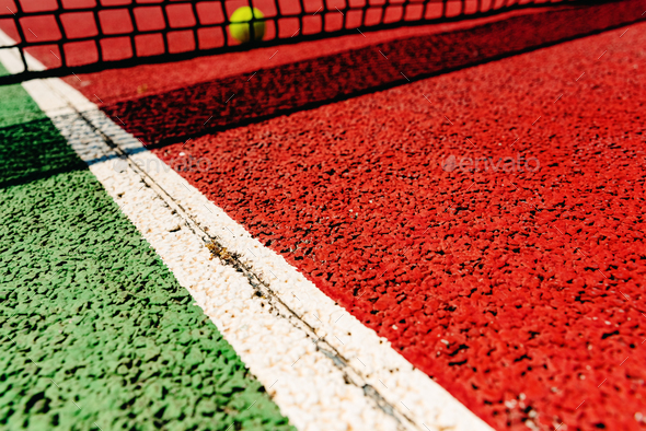 Background of a tennis net with a ball on the other side out of focus ...