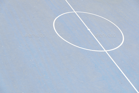 Center of a cement football field, seen from above, with copy space ...