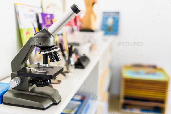 Microscope in a children's classroom. Stock Photo by joaquincorbalan