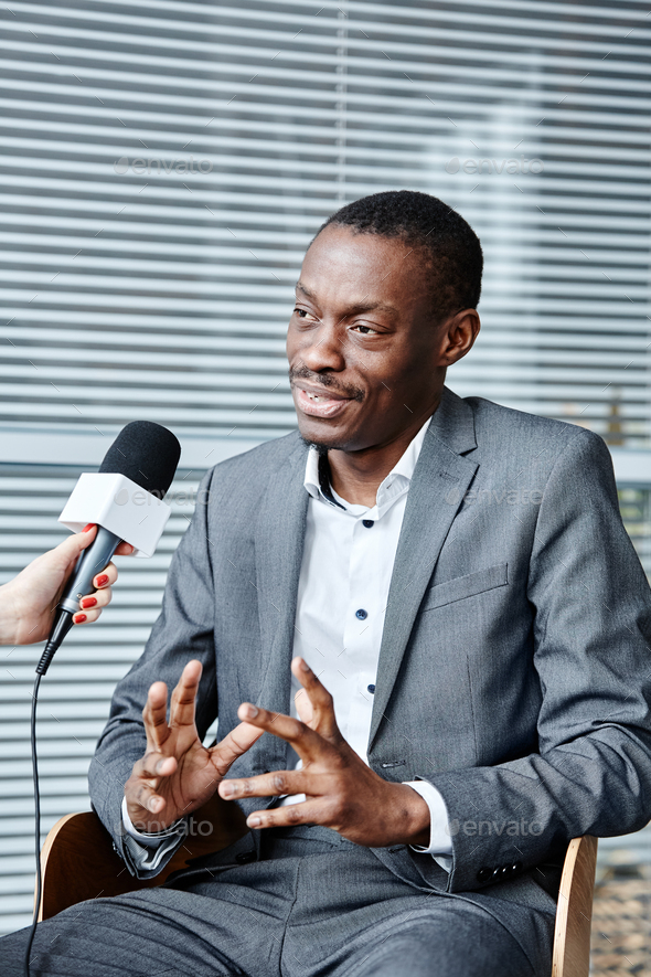 African American Businessman Giving Interview Stock Photo by ...