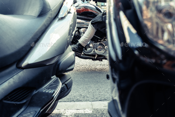 Feet of biker leaning on the footrest of his great motorcycle. Stock ...