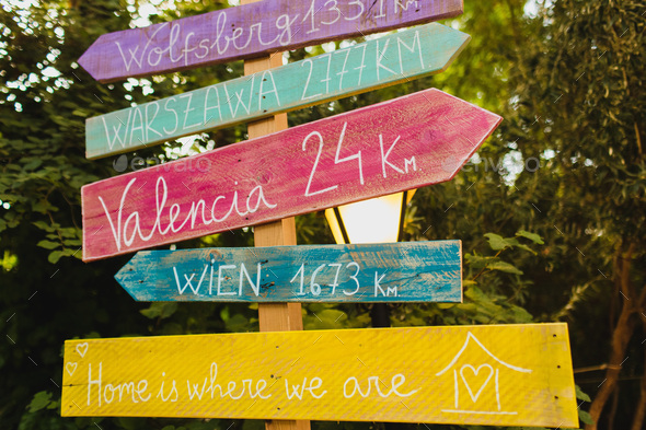 Wooden signposts at events and weddings Stock Photo by joaquincorbalan
