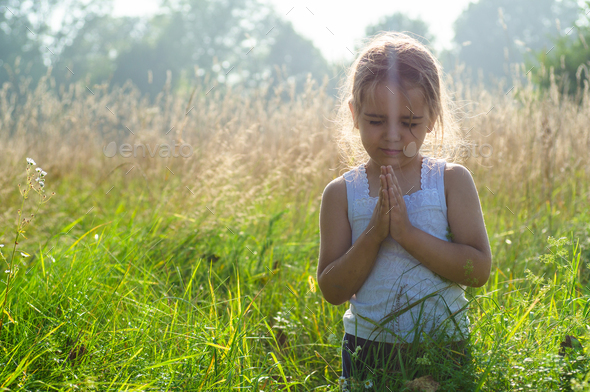 Little girl praying Stock Photo by StiahailoAnastasiia | PhotoDune