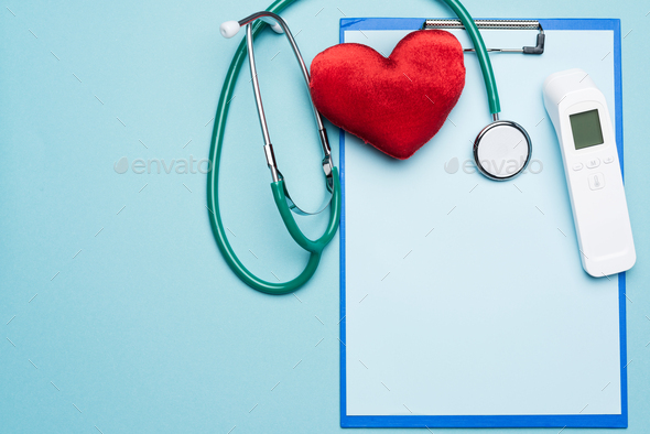 Red heart , electronic thermometer and other medical supplies Stock ...