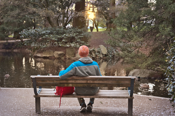 Man on the bench Stock Photo by Galyna_Andrushko | PhotoDune