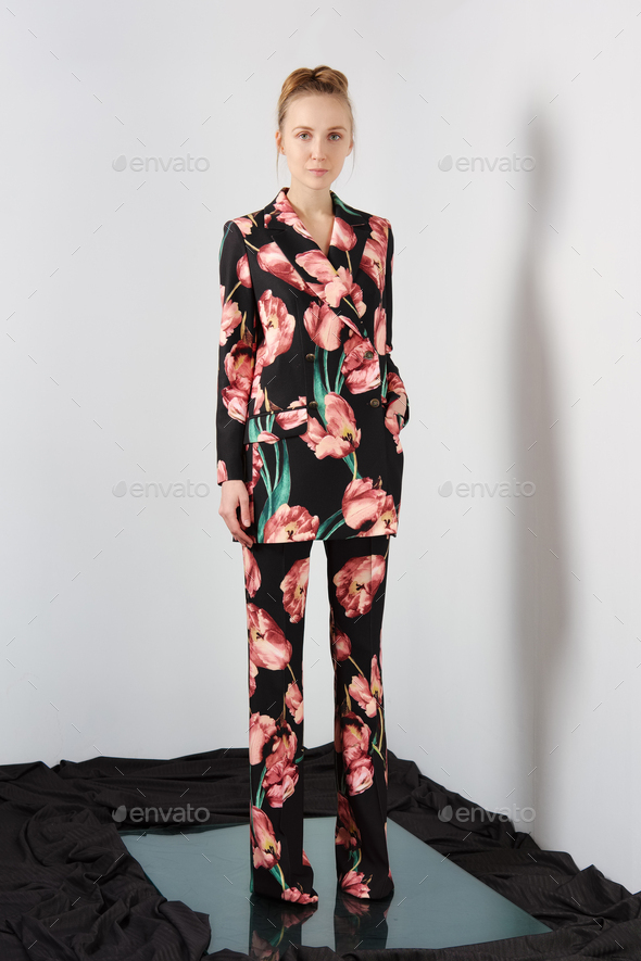 Fashion model in designers suit with floral print Stock Photo by boomeart