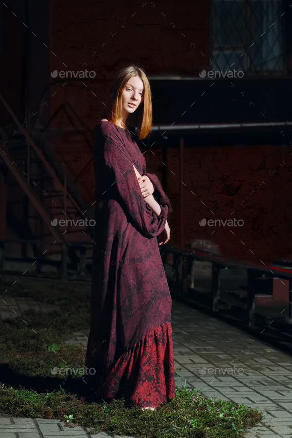 fashion model in designers dress in night show Stock Photo by boomeart