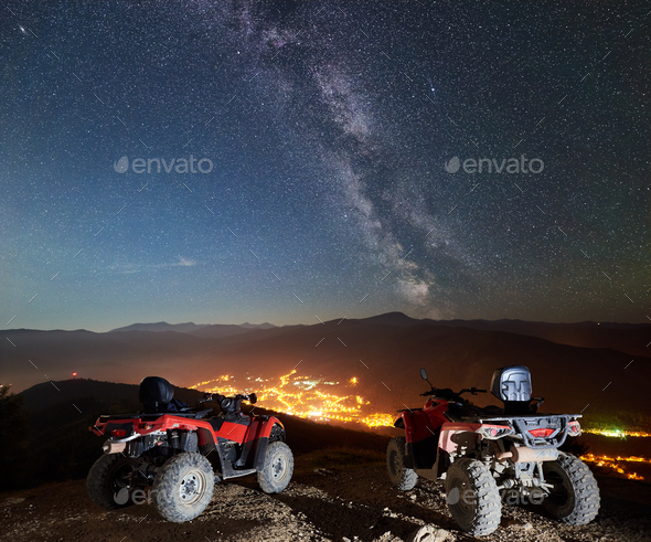 Atv quad motorbikes in the mountains under night starry sky Stock Photo ...