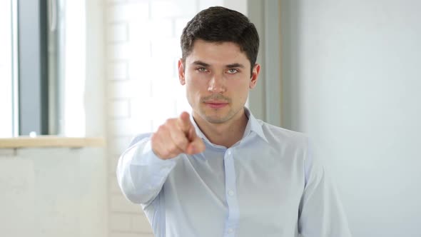 Man Pointing at Camera in Office Indoor, Stock Footage | VideoHive