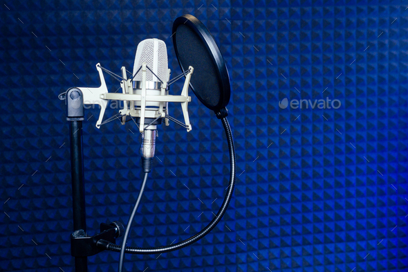 Microphone and headphone in a recording studio soundproof wall. Stock ...