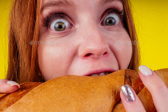Joyful funny redhaired ginger girl with wild eyes suffering from ...