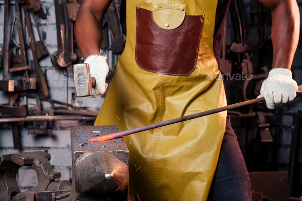 handsome african american blacksmith male worker working i Stock Photo ...