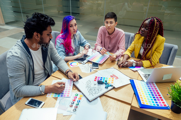 creative agency designer team working together Stock Photo by yurakrasil