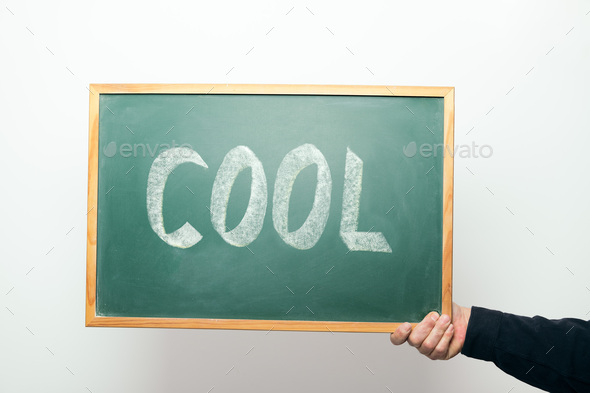 chalkboard with the word COOL handwritten in chalk Stock Photo by Raul ...