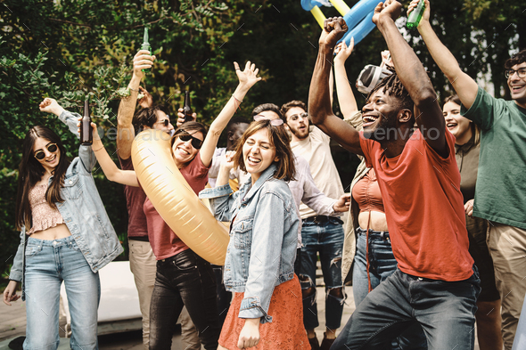 playful group of young people dancing and socializing together Stock ...