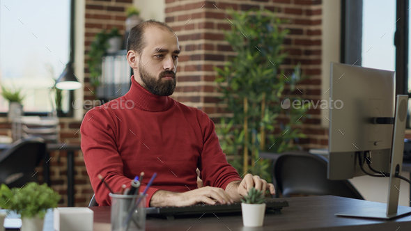 Portrait of office worker using computer to develop analysis Stock ...