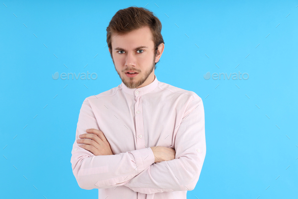 Concept of people, young man on blue background Stock Photo by ...