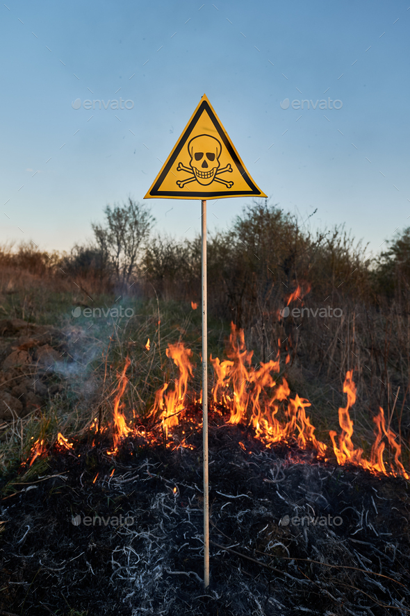 Burning dry grass and warning sign Stock Photo by anatoliy_gleb | PhotoDune