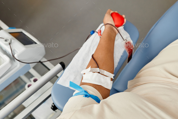 Close Up Hand at Blood Donation Stock Photo by seventyfourimages ...