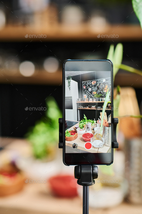 Smartphone On Tripod In Modern Kitchen Stock Photo by AnnaStills ...