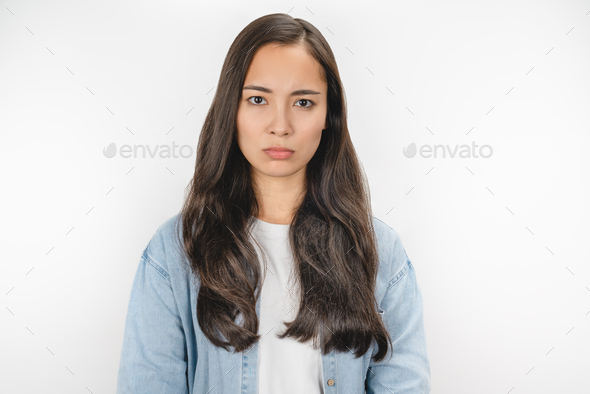 Close up portrait of emotional woman with offended face isolated over ...