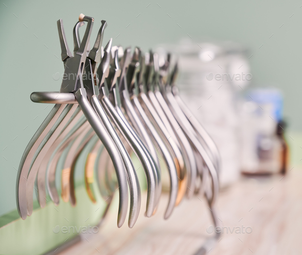 Collection of orthodontic instruments for dental procedure. Stock Photo ...