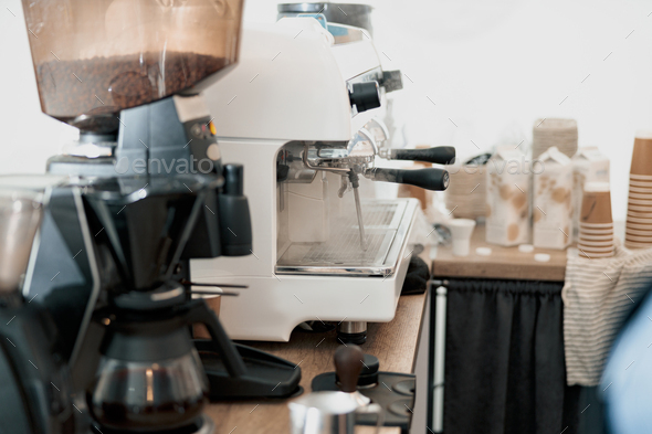 Professional modern coffee machine on counter in cafeteria Stock Photo ...