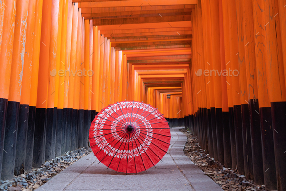 Traditional red Japanese umbrella in Fushimi Inari Taisha in Kyoto ...