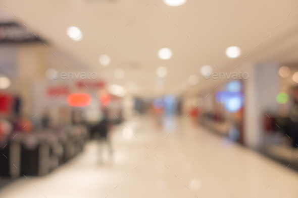 Abstract bokeh blurry background of retail shops in shopping mall or ...