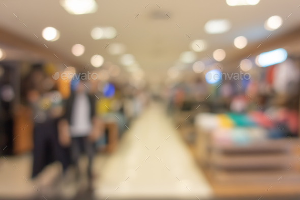 Abstract bokeh blurry background of retail shops in shopping mall or ...