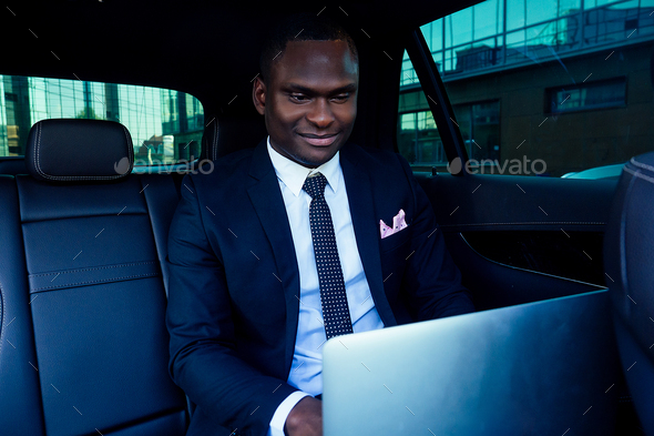 Handsome successful rich african american business men chief in a ...