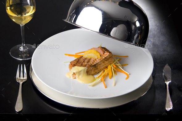 image of gourmet fish dish, unveiled by the innkeeper Stock Photo by ...