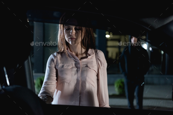 thief following beautiful woman opening car at nighttime Stock Photo by ...