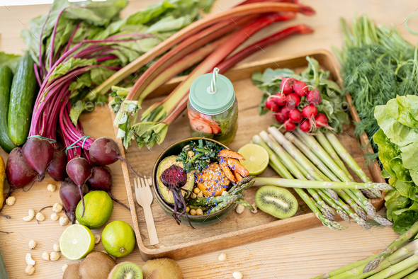 Table full of fresh food ingredients Stock Photo by RossHelen | PhotoDune