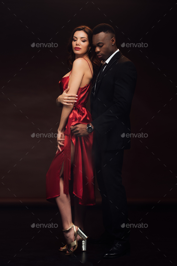 Beautiful Sensual Interracial Couple In Formal Wear Posing Isolated On