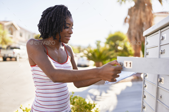 african american woman checking mail in las vegas Stock Photo by joshua ...