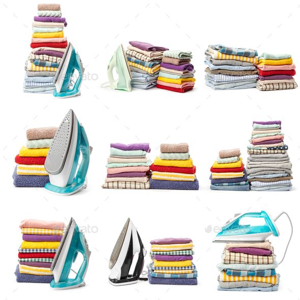 stacks of clothing collection isolated on white Stock Photo by FabrikaPhoto