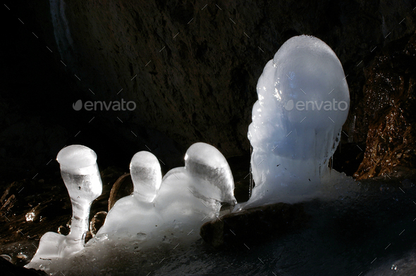 Ice stalagmites in ice cave. Scarisoara, Romania Stock Photo by salajean