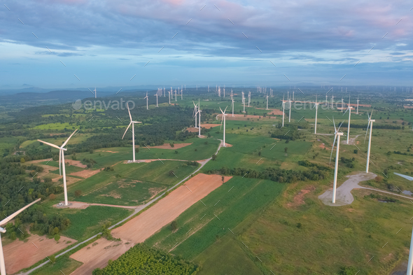 Wind turbines or windmill farm field in industry factory. Power ...