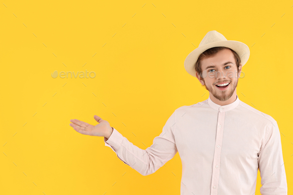 Concept of people, young man on yellow background Stock Photo by ...