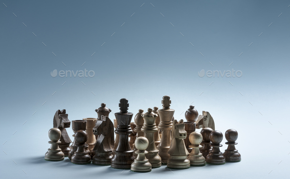Group of mixed chess pieces standing together Stock Photo by stokkete