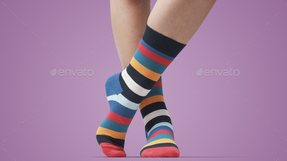 Model posing with multicolor socks Stock Photo by stokkete | PhotoDune