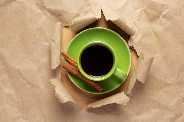 Cup of coffee at torn paper. Coffee espresso at cardboard Stock Photo ...