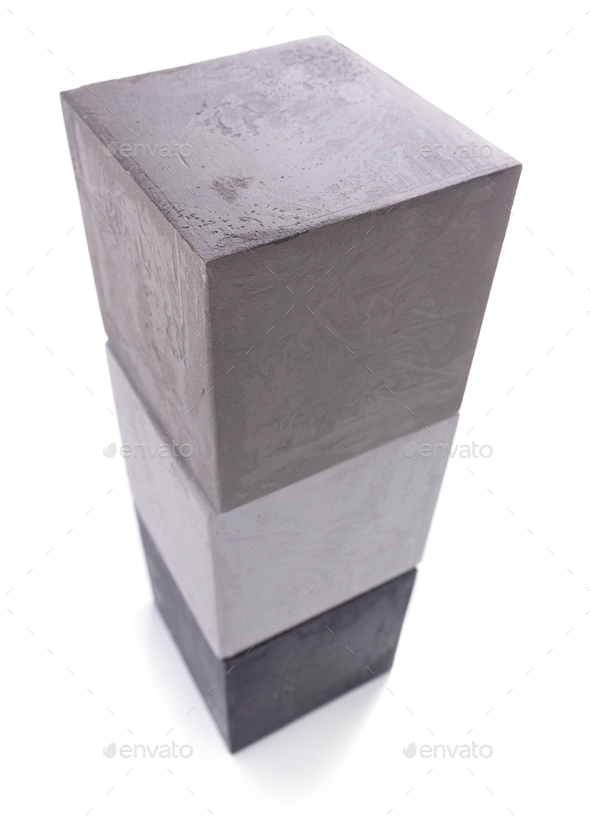 Concrete cube or cement block isolated at white background ...