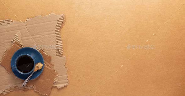 Cup of coffee at torn paper. Coffee espresso at cardboard Stock Photo ...