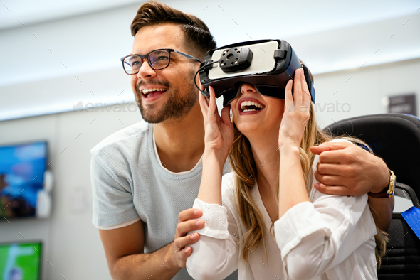 Group of people using virtual reality headset at exhibition, show. VR ...