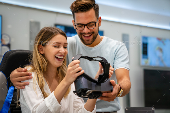 Group of people using virtual reality headset at exhibition, show. VR ...